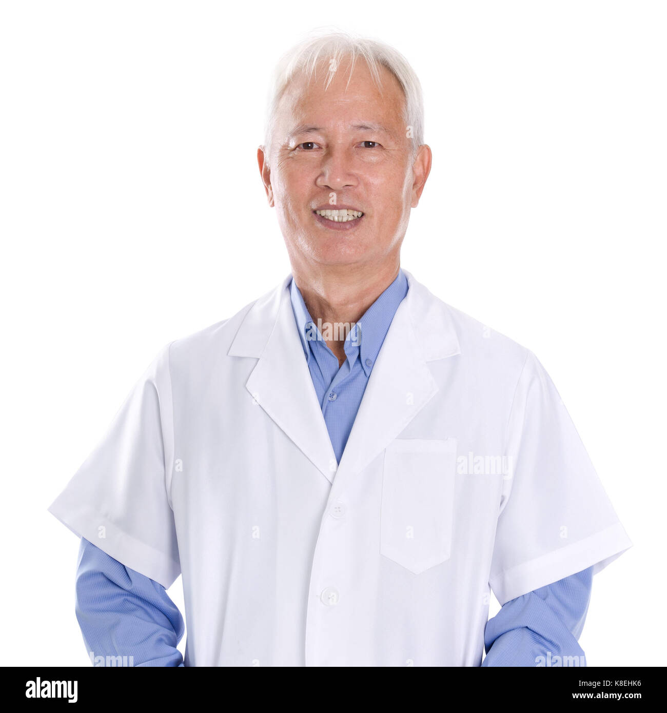 Portrait of friendly old Asian man in lab uniform smiling, standing ...