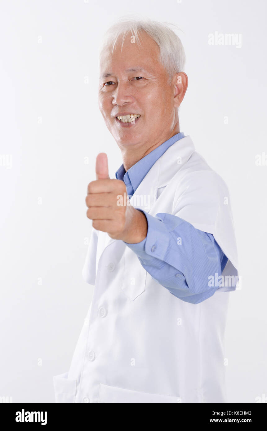Portrait of confident Asian lab people smiling and giving thumbs up ...
