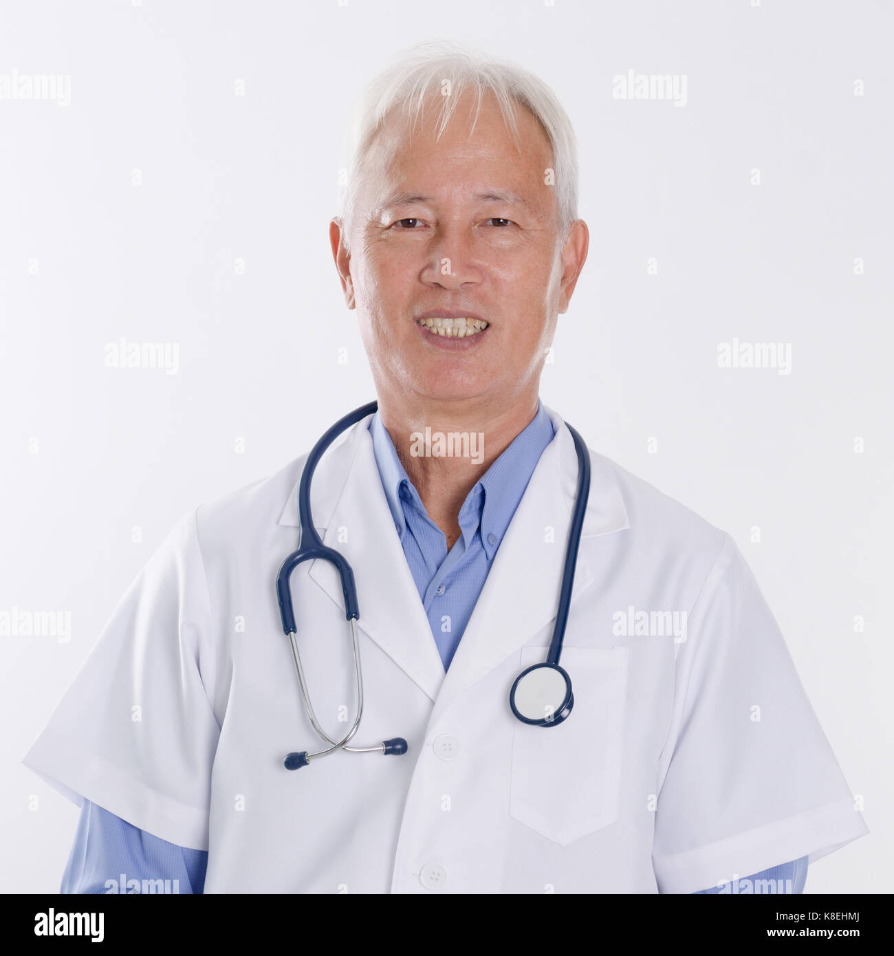 Portrait of confident Asian medical doctor smiling, standing isolated ...