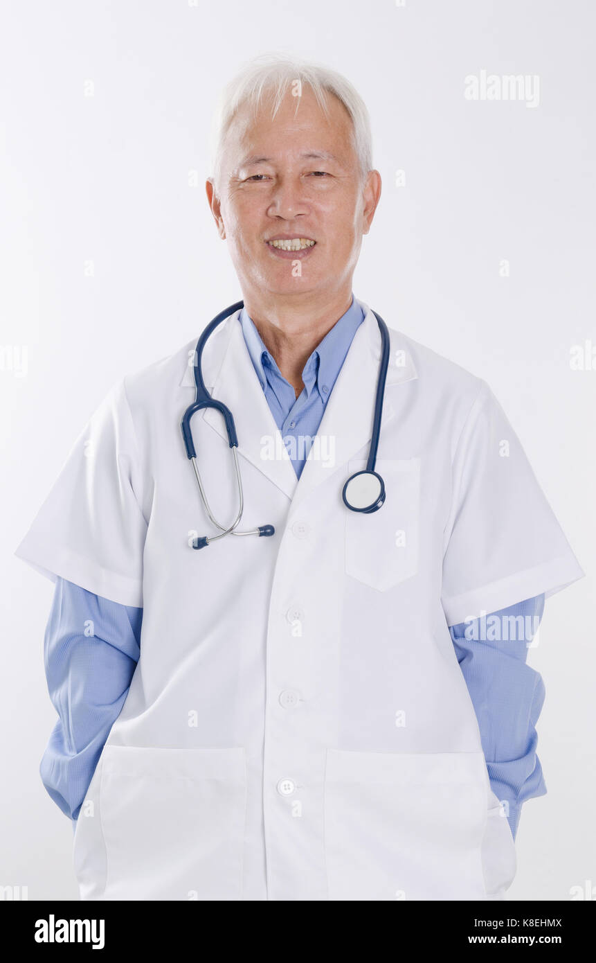 Portrait of Asian medical doctor smiling, standing isolated on white ...