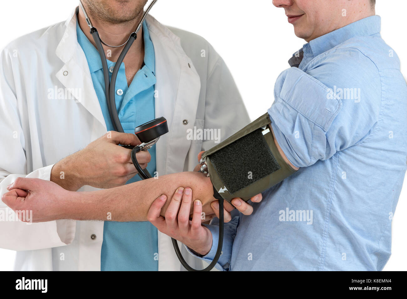 Doctor checking blood pressure of a patient hi-res stock photography ...