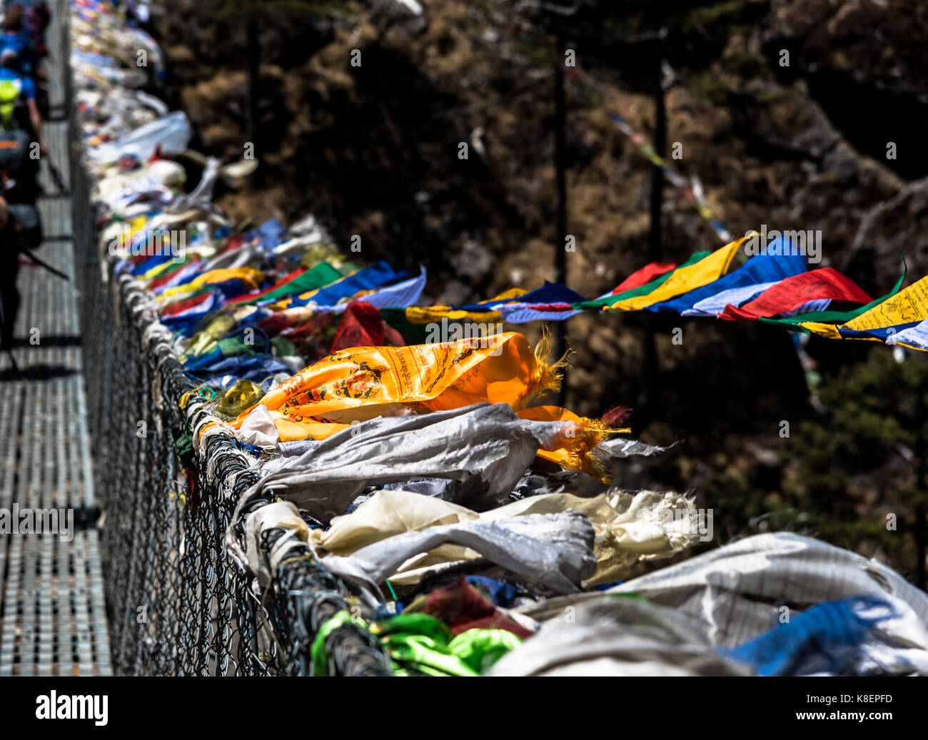 Himalayan suspension bridge with prayer flags Stock Photo - Alamy