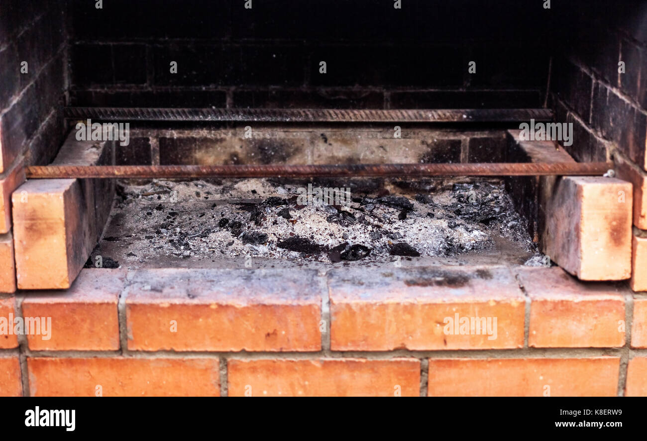 Ash in brick fireplace like symbol of time Stock Photo - Alamy