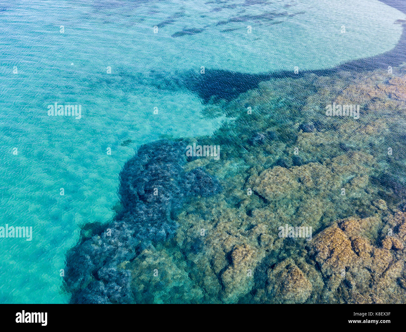 Aerial view of rocks on the sea. Overview of the seabed seen from above ...