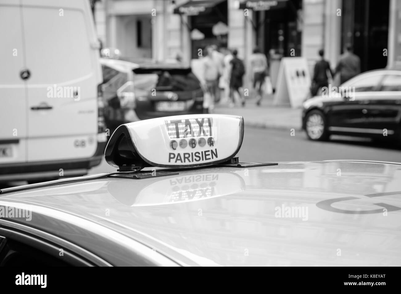 Paris, France: parisian taxi logo in the central district of Paris ...