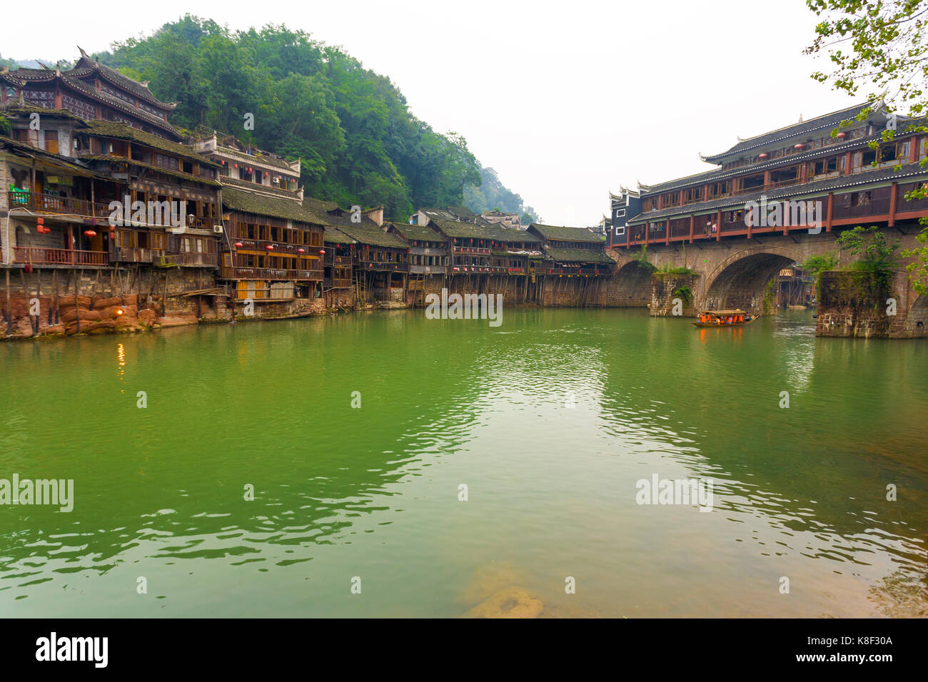 Riverside houses next to the Phoenix Hong or Huangsi Bridge in the ...