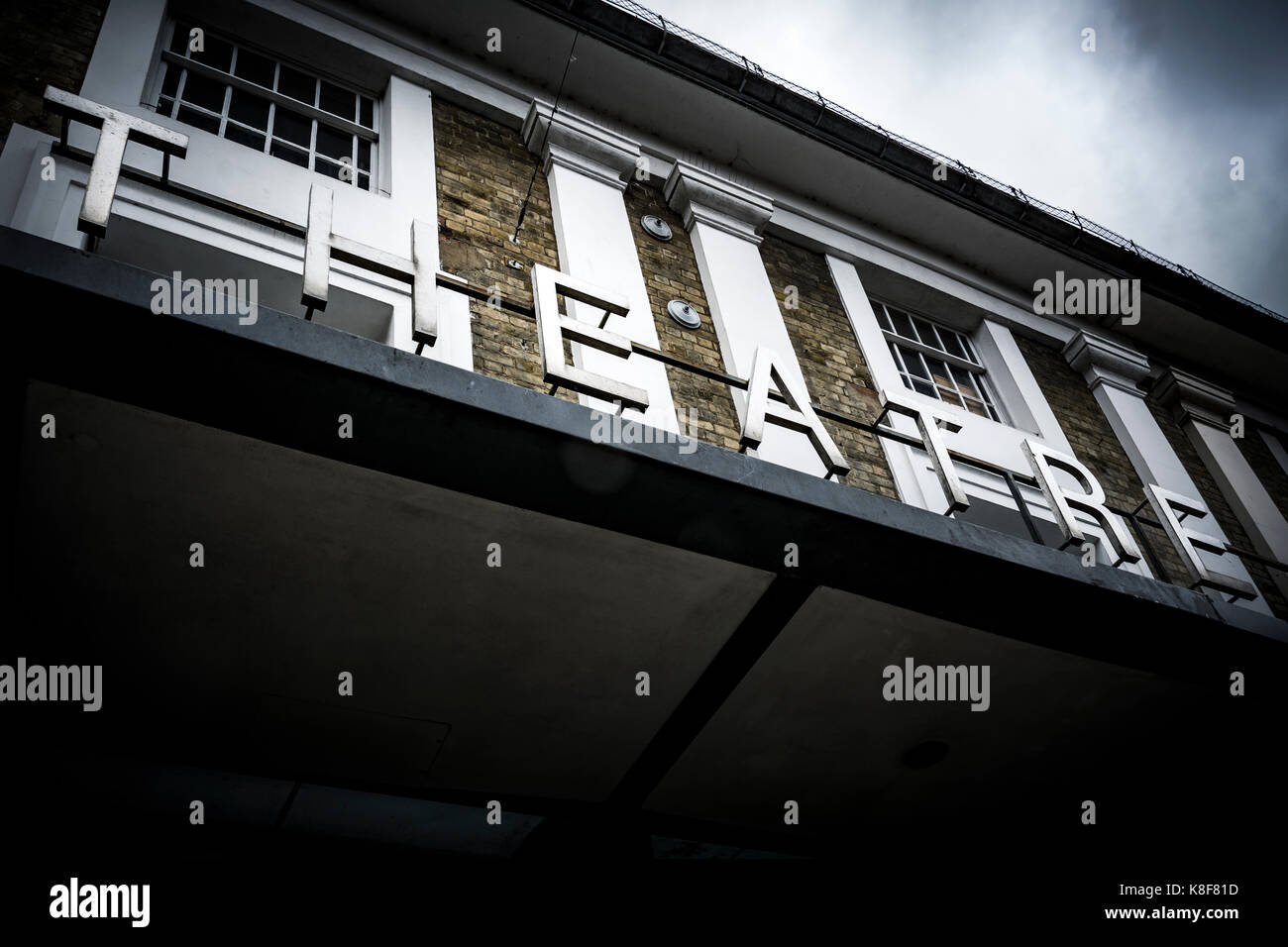 Theatre sign over main entrance at local theatre venue Stock Photo - Alamy