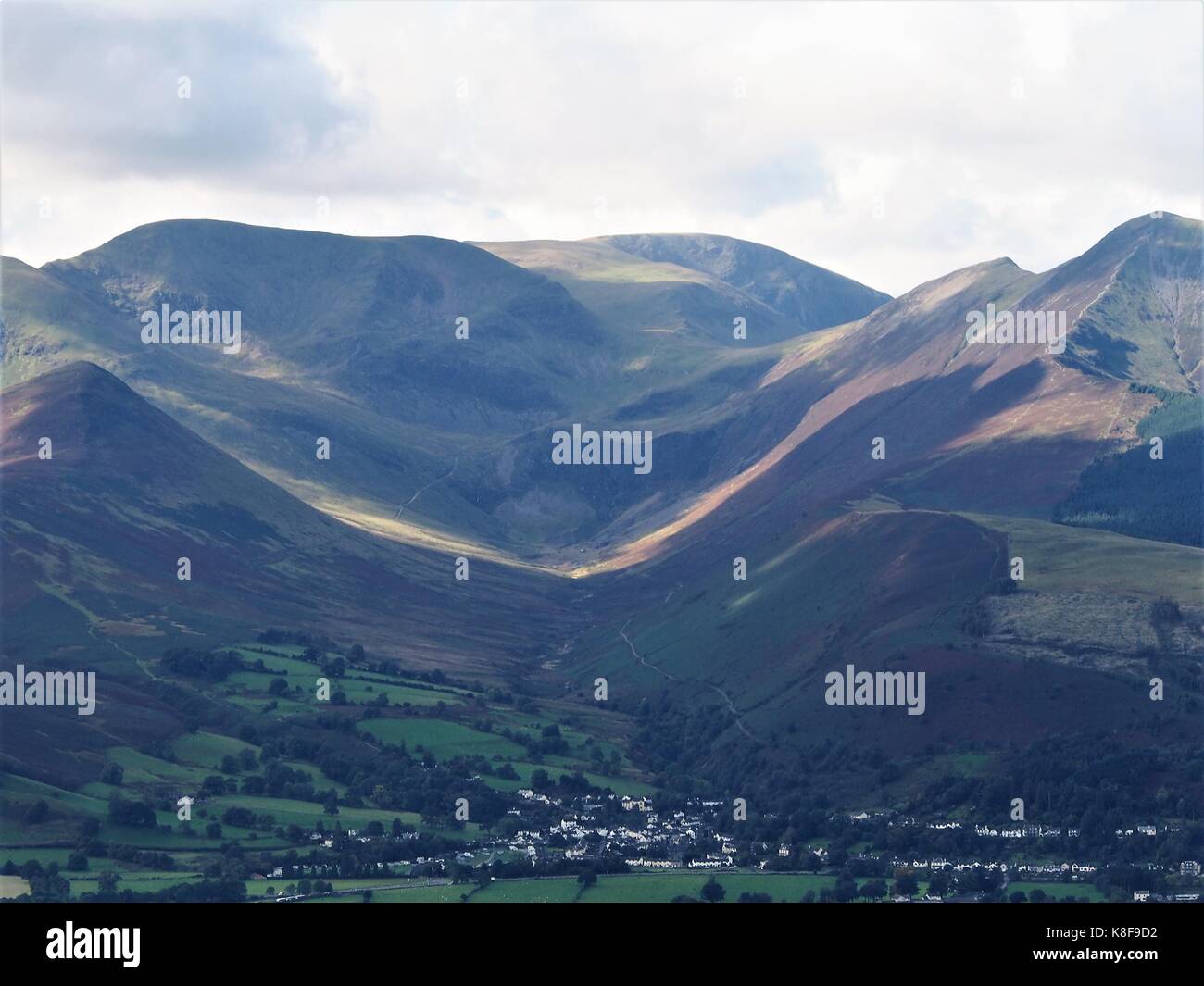 Coledale lit by strips of sunlight, Lake District, Cumbria, United ...