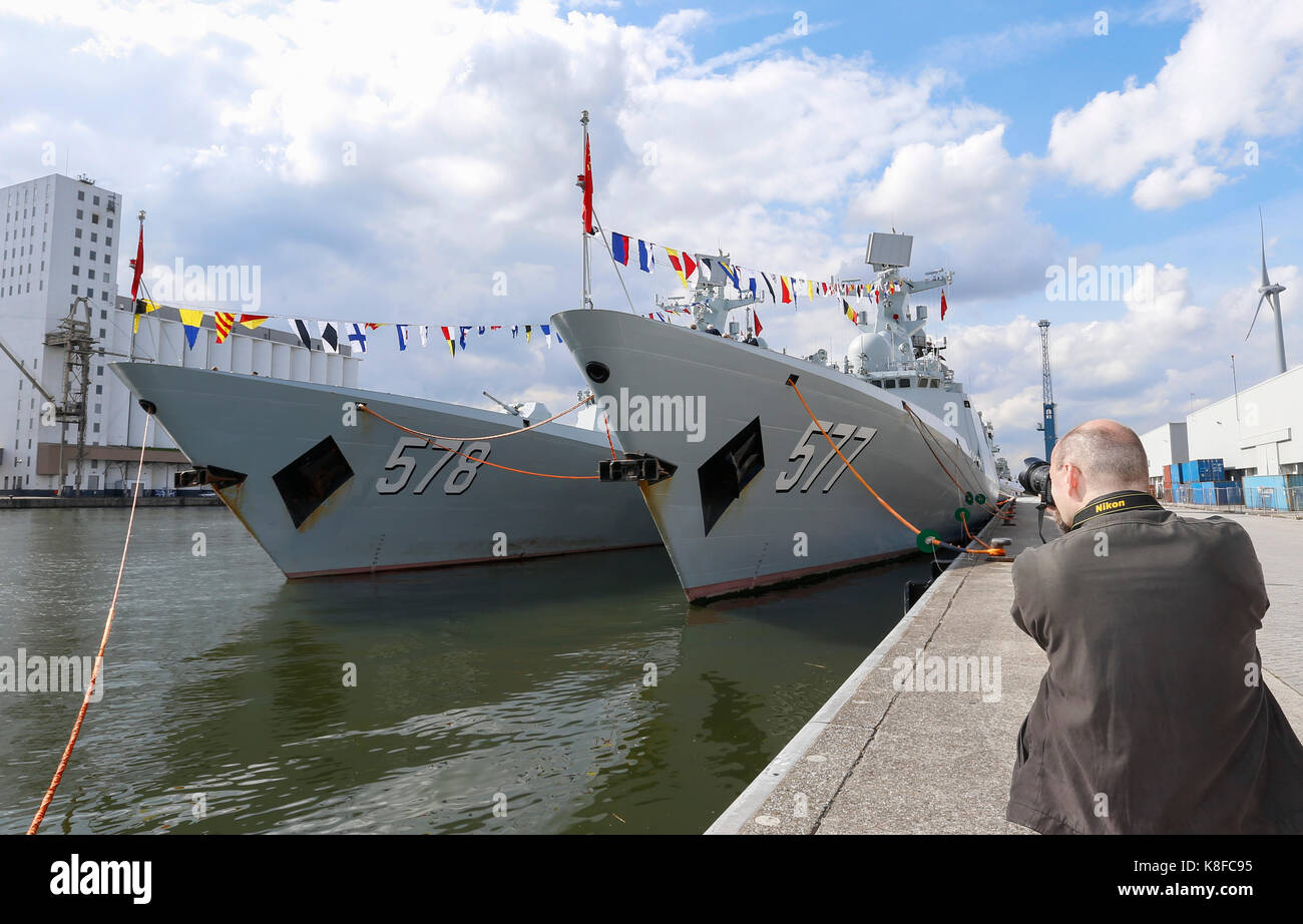 Antwerp, Belgium. 17th Sep, 2017. A visitor takes photos of PLA Navy ...