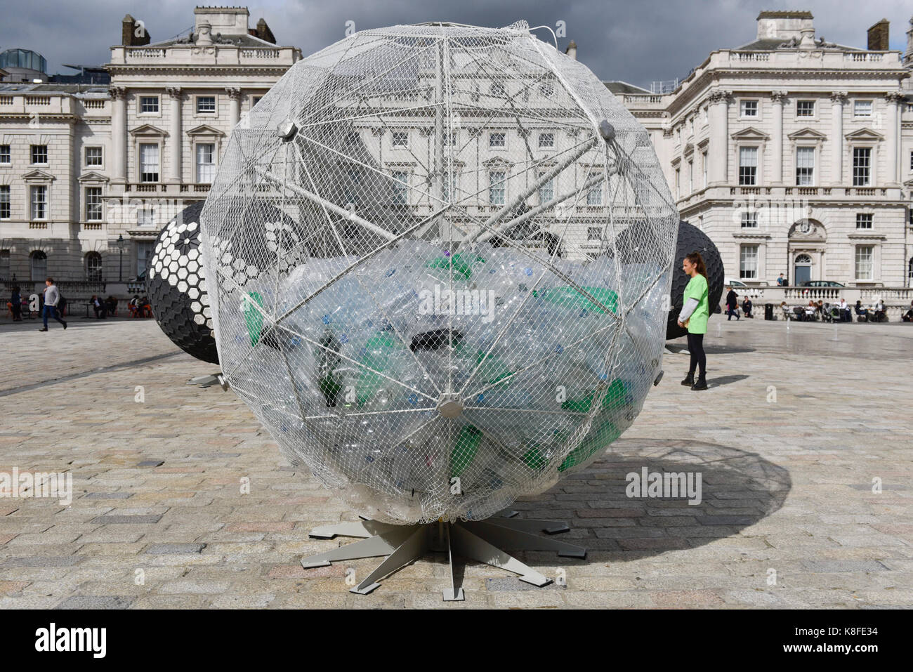 London, UK. 19th Sep, 2017. A staff member looks at an installation of ...