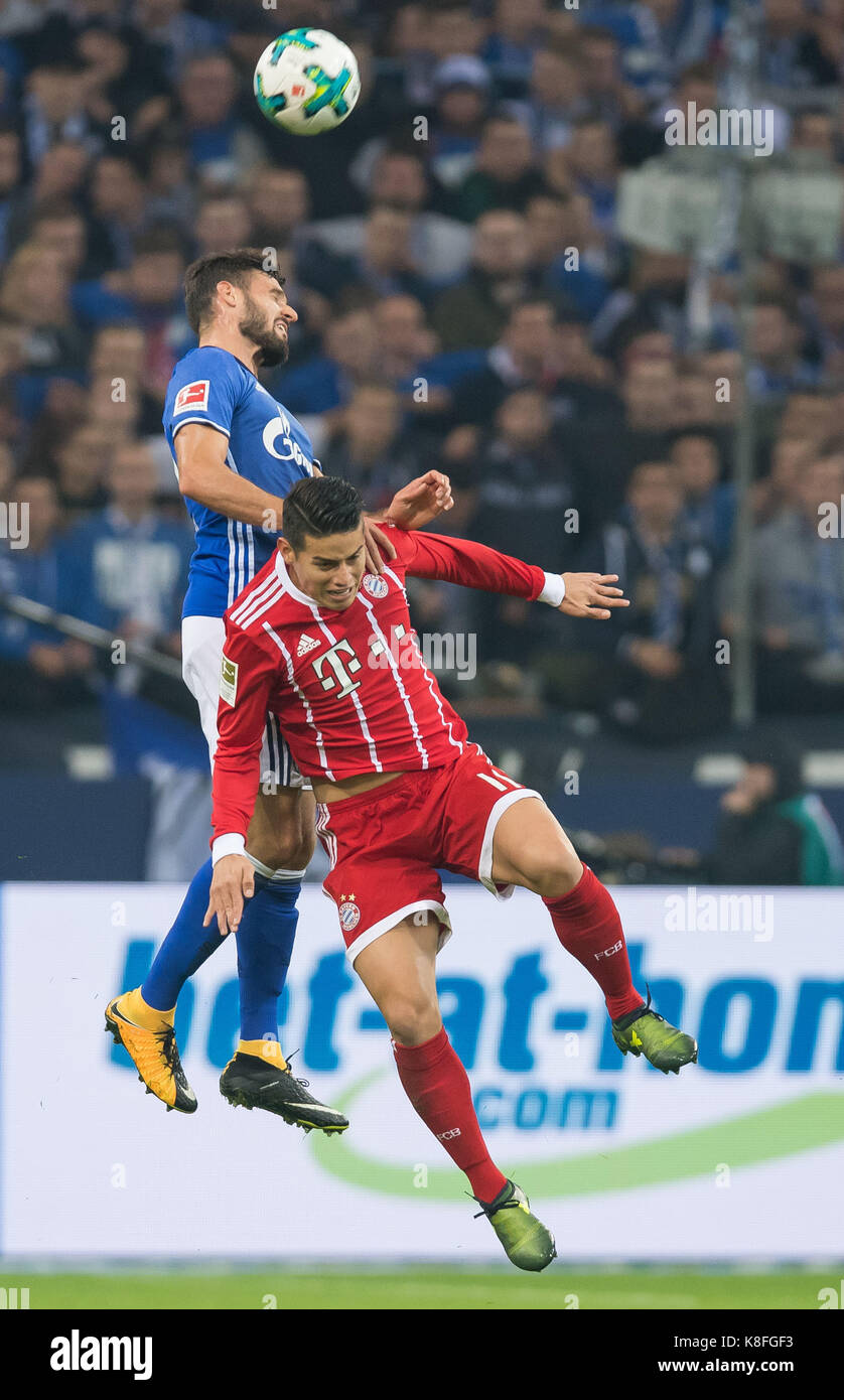 Gelsenkirchen, Germany. 19th Sep, 2017. Schalke's Daniel Caligiuri (L ...