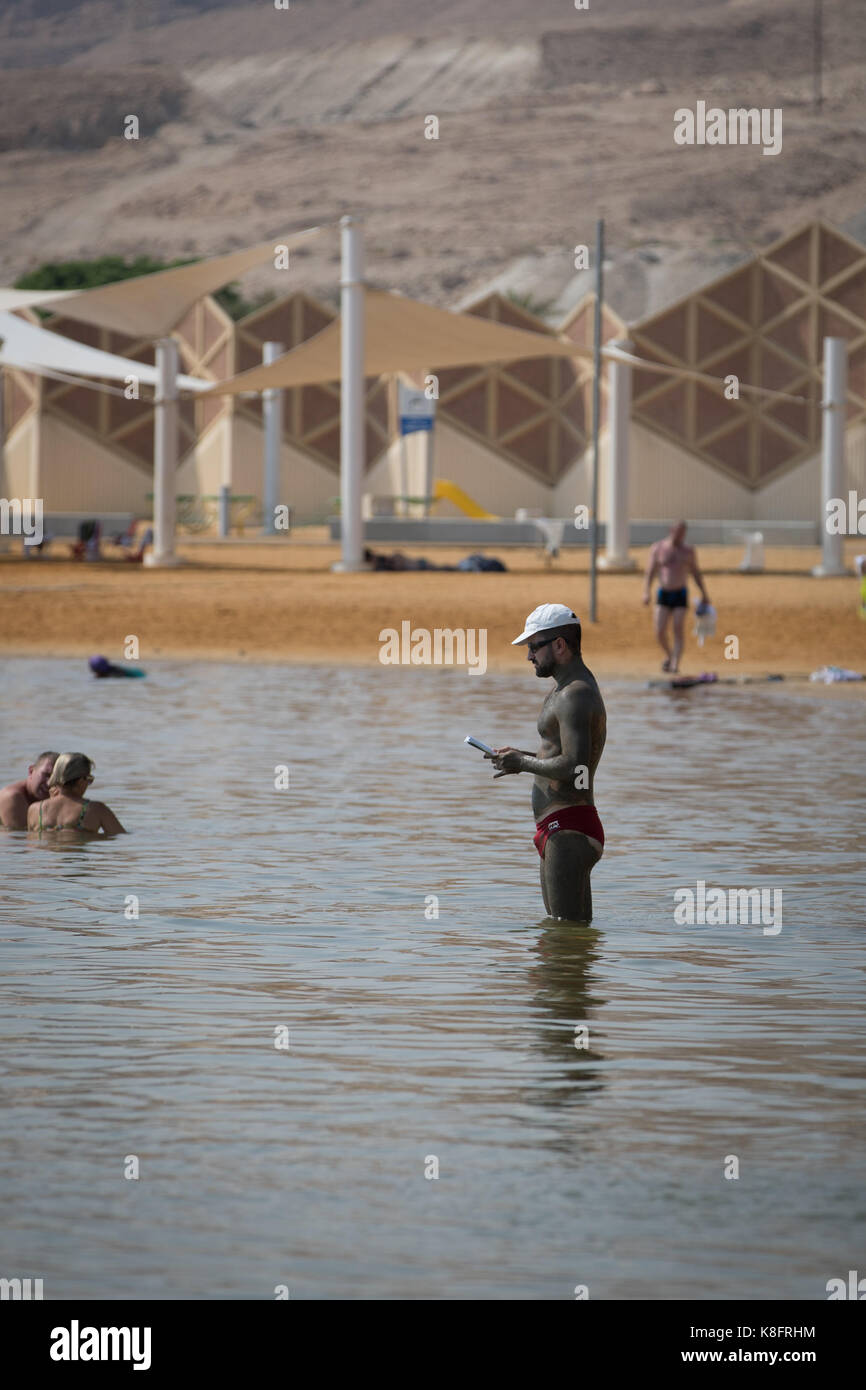 Ein Bokek, Israel. 20th Sep, 2017. A man stands in the Dead Sea at Ein Bokek, Israel, Sept. 19 ...