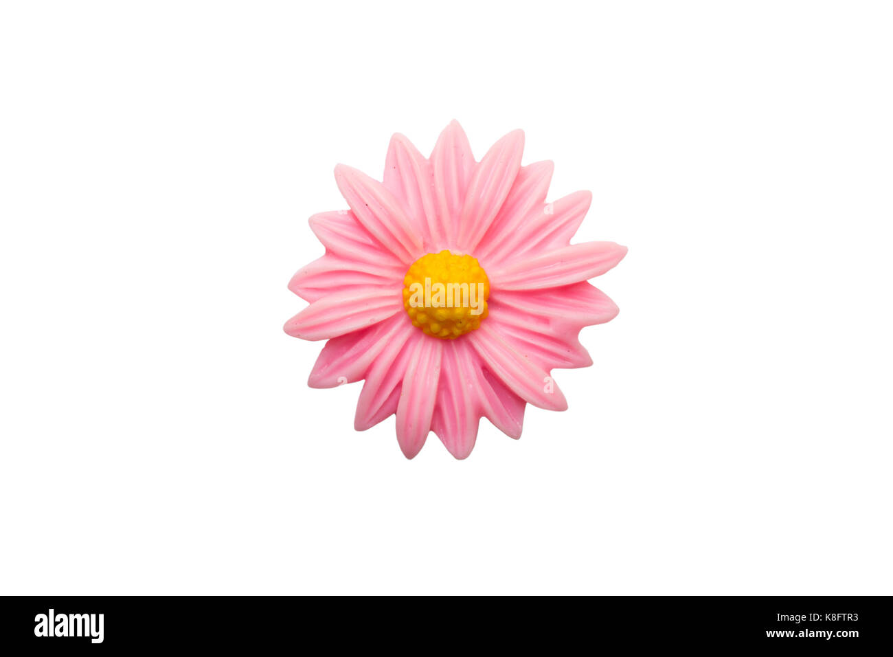 Close up of pink plastic flower on white background Stock Photo - Alamy