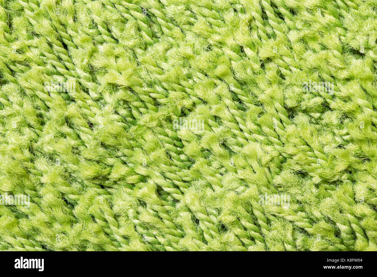Close up of green yarn carpet for background Stock Photo - Alamy
