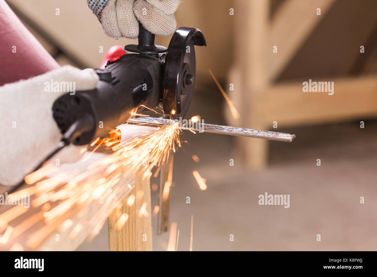 Angel grinder make a flash sparks Stock Photo - Alamy