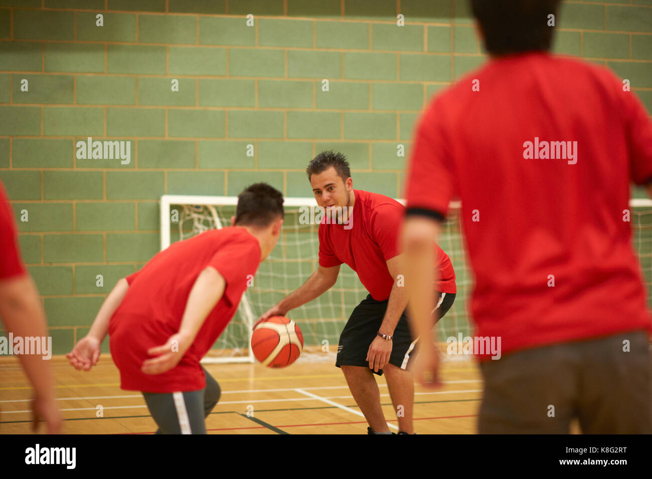 Students playing basketball Stock Photo - Alamy