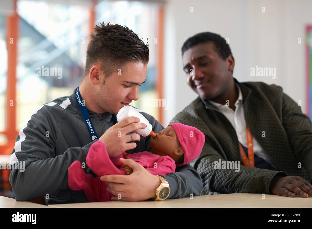 Child care hi-res stock photography and images - Alamy