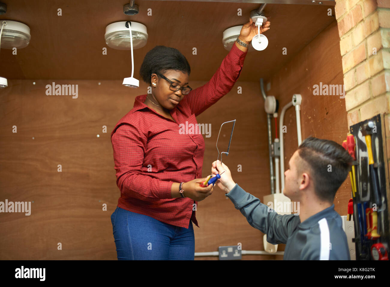 Students learning how to do electrical work Stock Photo - Alamy