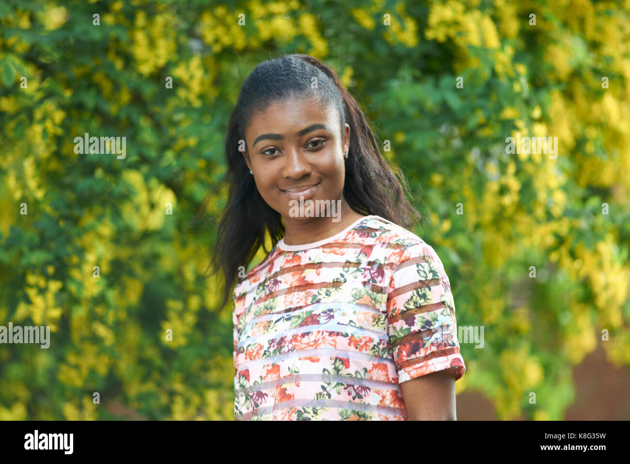 Beautiful female teenager looking camera hi-res stock photography and ...