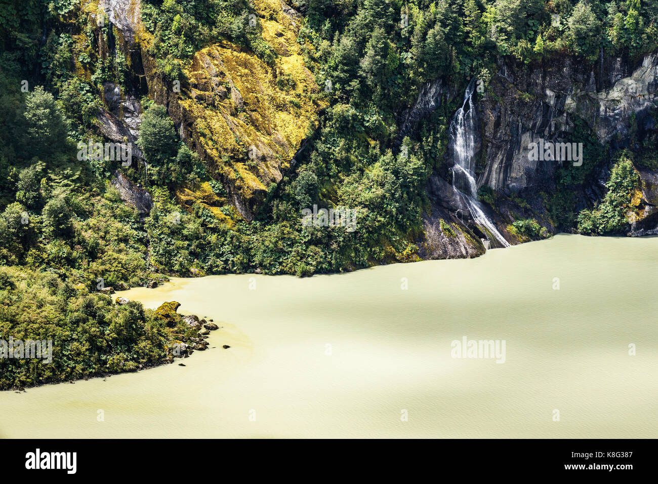 Detail of rocky cliffs and Lake Verde, Queulat National Park, Chile ...