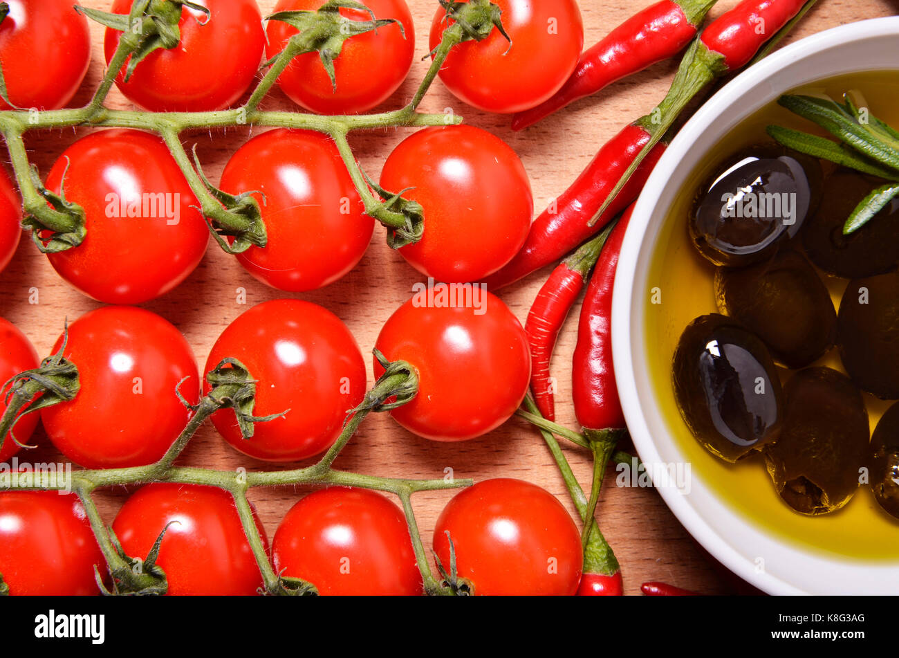 black olives and chili peppers Stock Photo - Alamy
