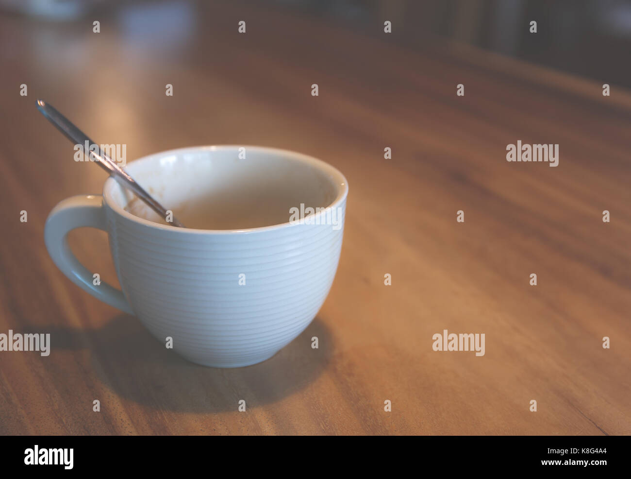coffee cup on table in coffee shop Stock Photo - Alamy
