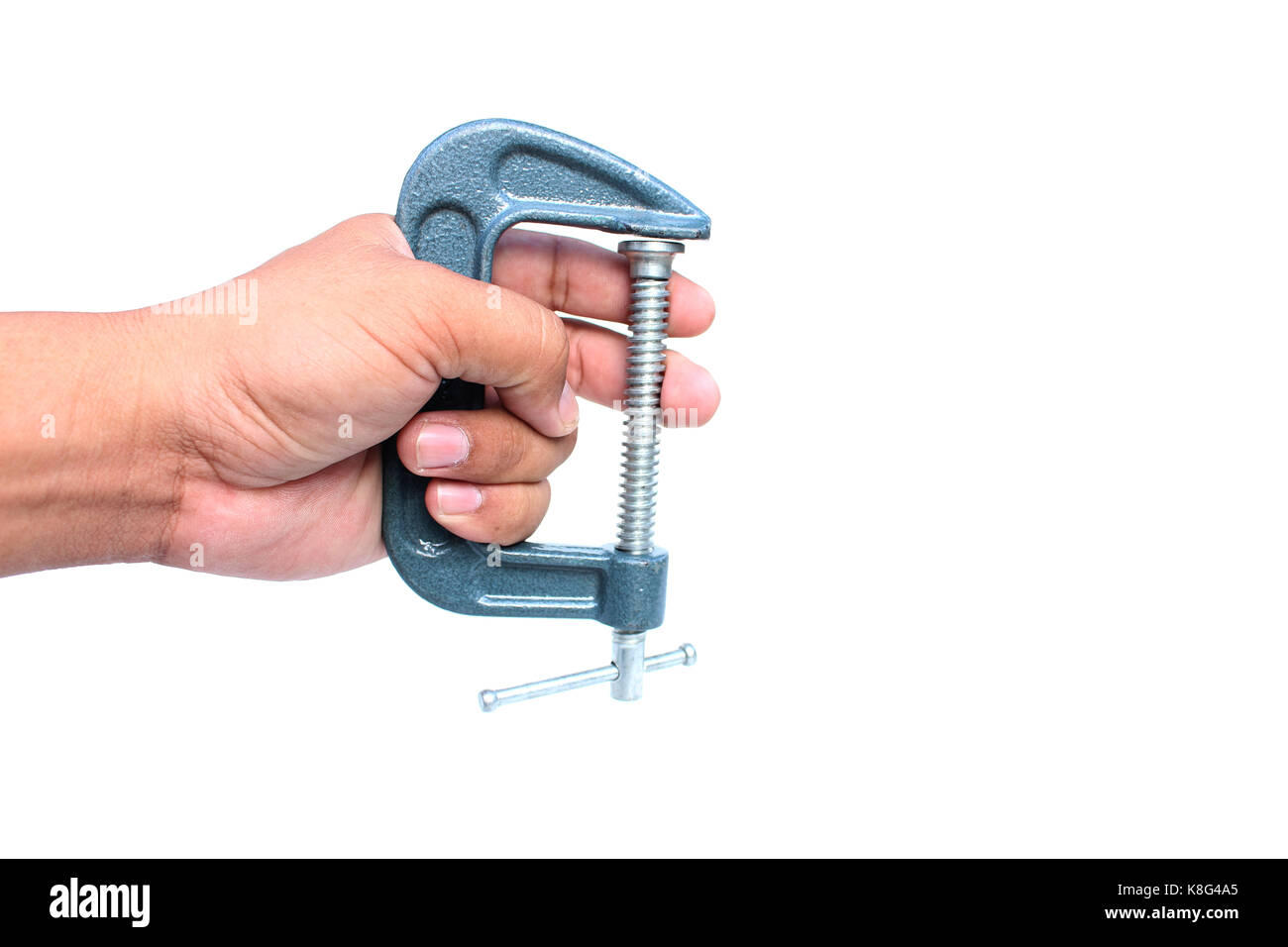 hand holding c clamp on isolated Stock Photo - Alamy