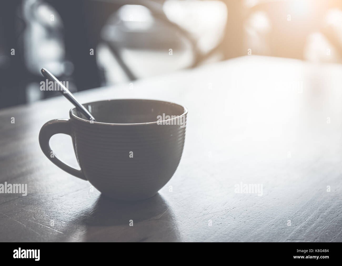 coffee cup on table in coffee shop Stock Photo - Alamy