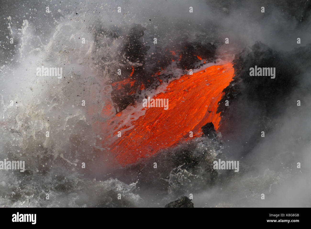 Lava flow enters the sea in Hawaii Stock Photo - Alamy