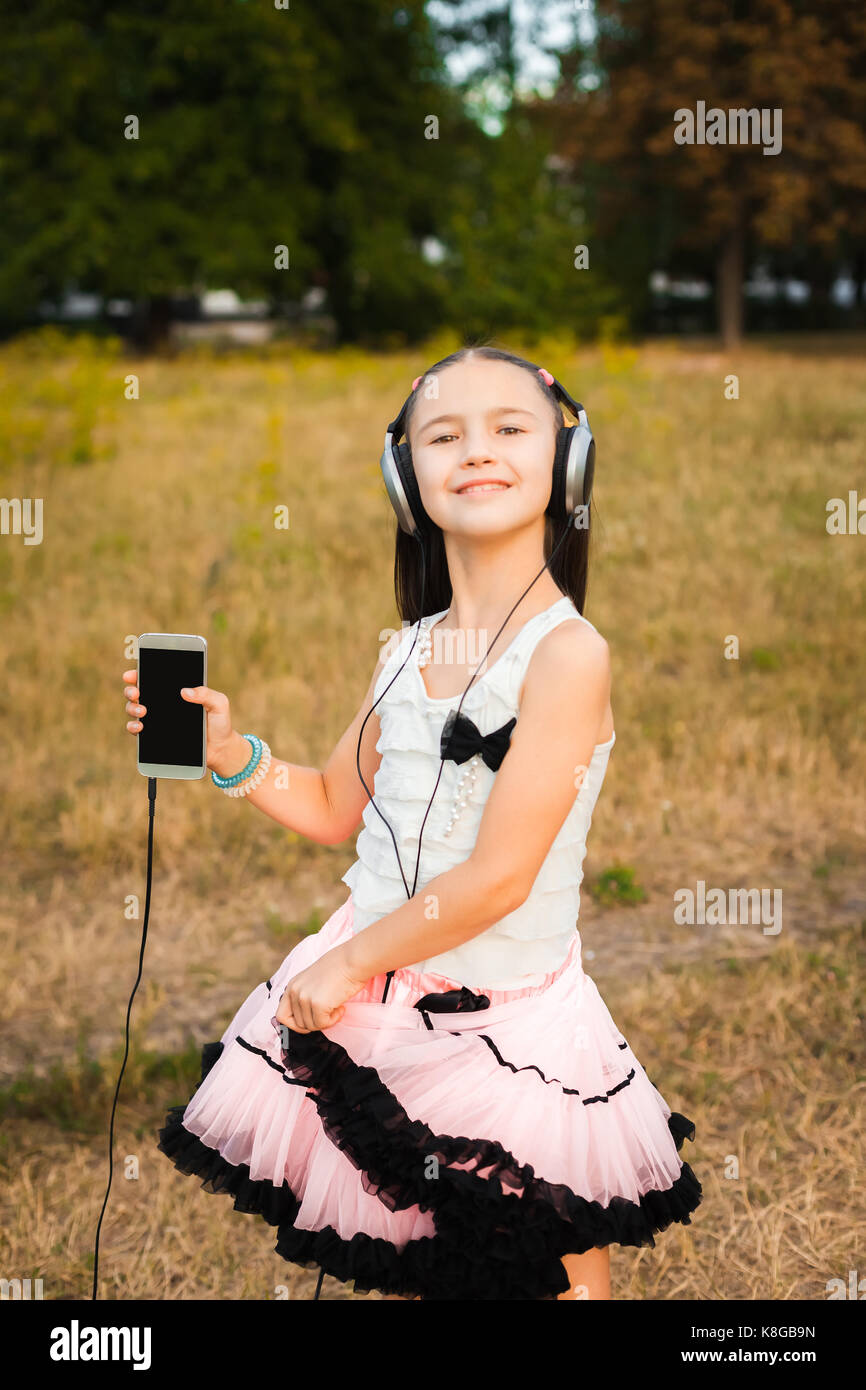 musical girl dancing with smile Stock Photo - Alamy