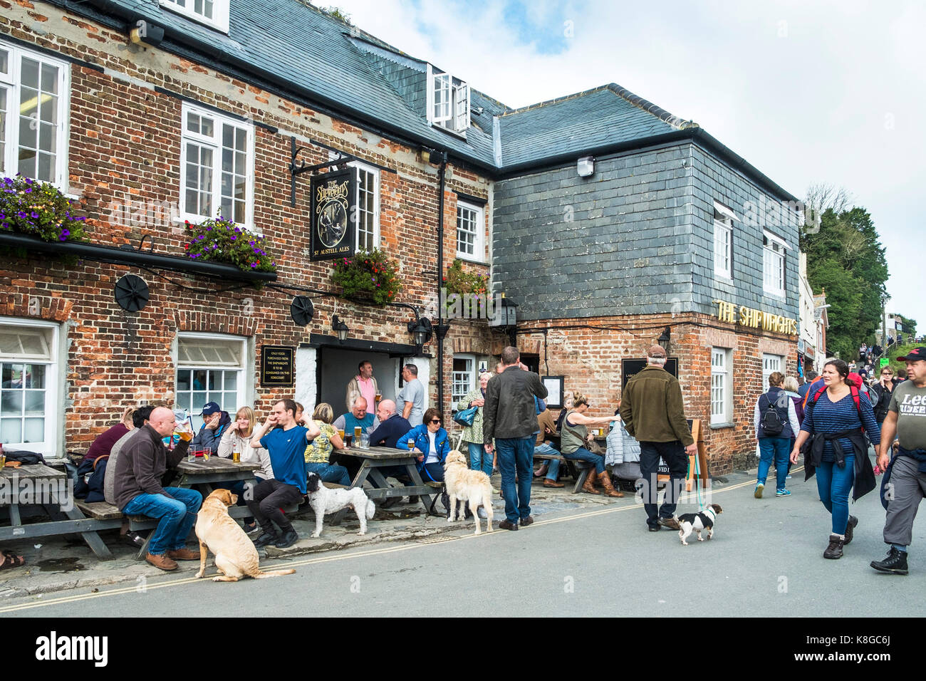 Historic pub - customers relaxing outside The Shipwrights an historic ...