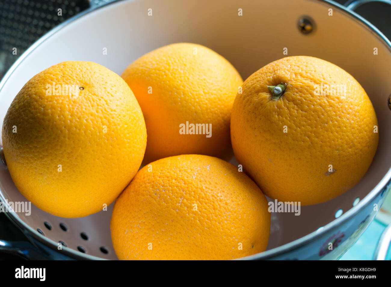 A bowl with a couple of oranges from above Stock Photo - Alamy