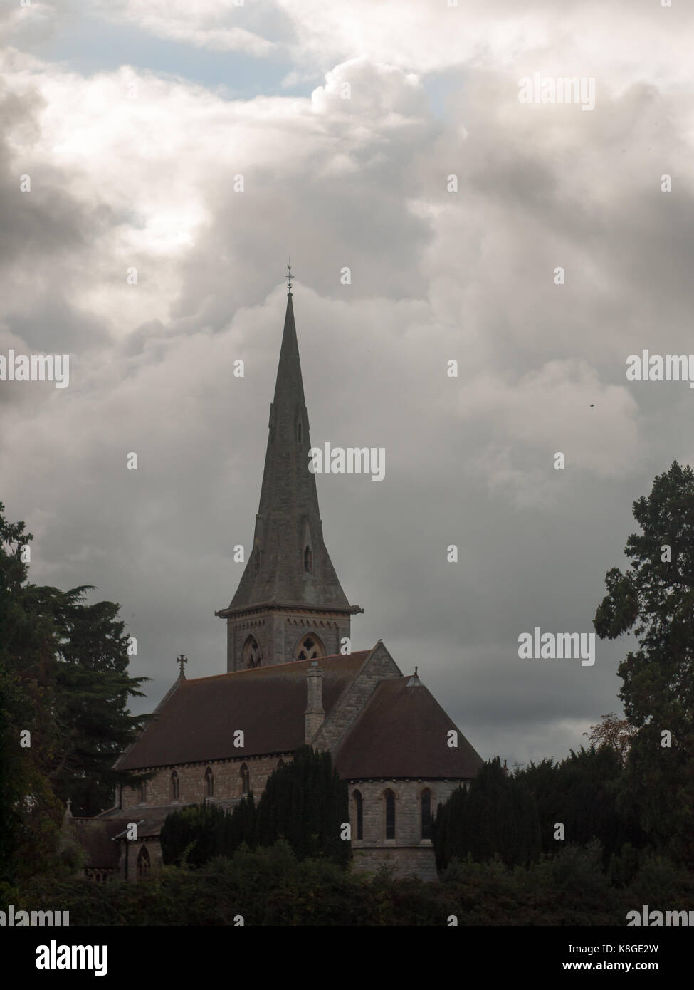 dark scene with church on rainy overcast day england Stock Photo - Alamy