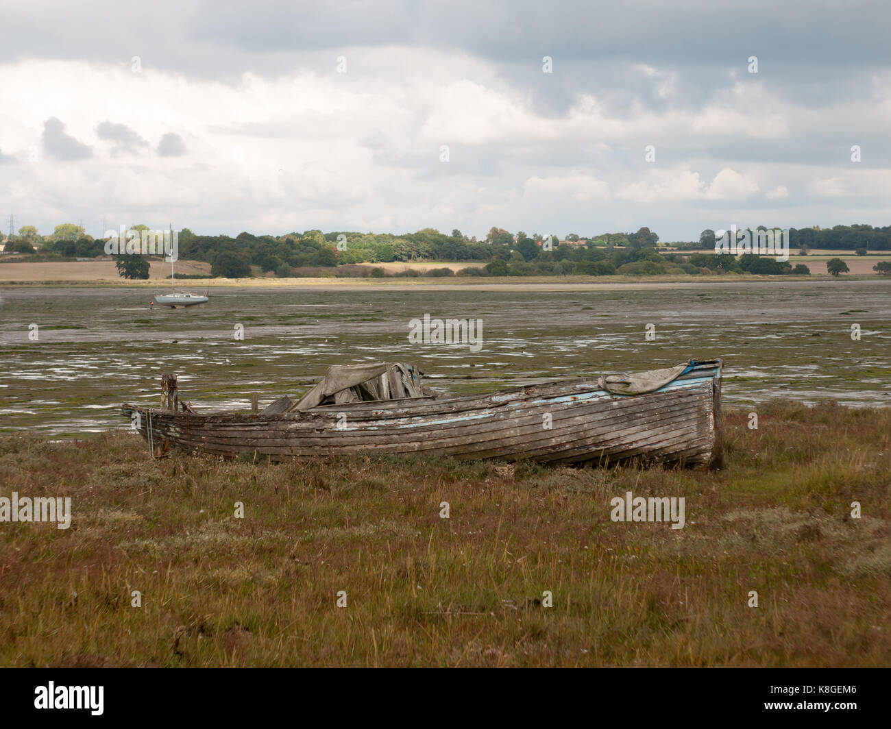 old wooden boat ruins decaying abandoned estuary scene Stock Photo - Alamy