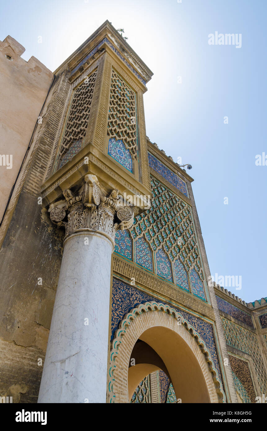 Famous Bab Mansour gate with elaborate decoration, pillars, and arches ...