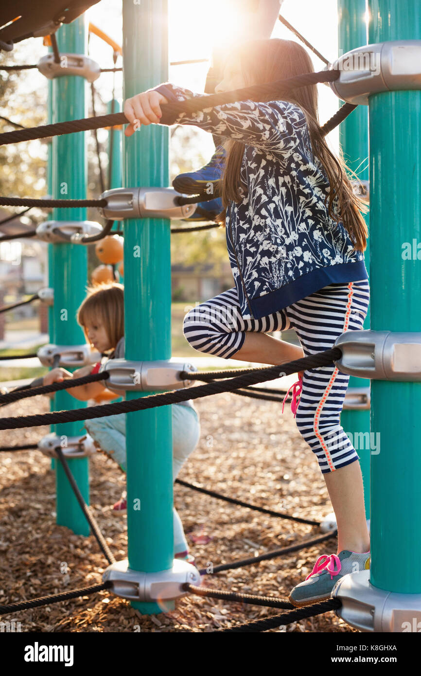 Children playing in playground Stock Photo - Alamy
