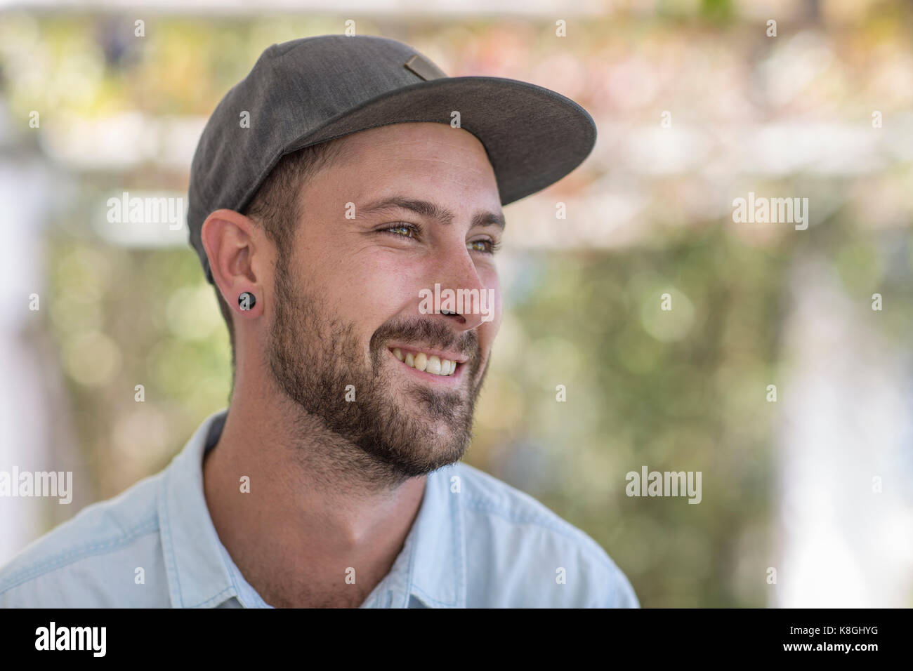 Smiling man outdoors hi-res stock photography and images - Alamy
