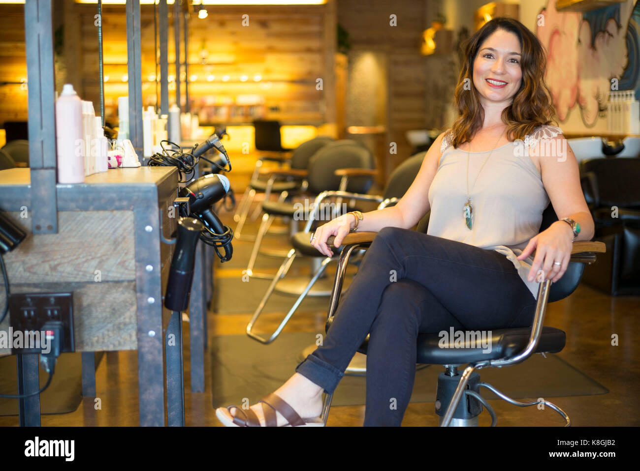 Happy salon owner Stock Photo - Alamy
