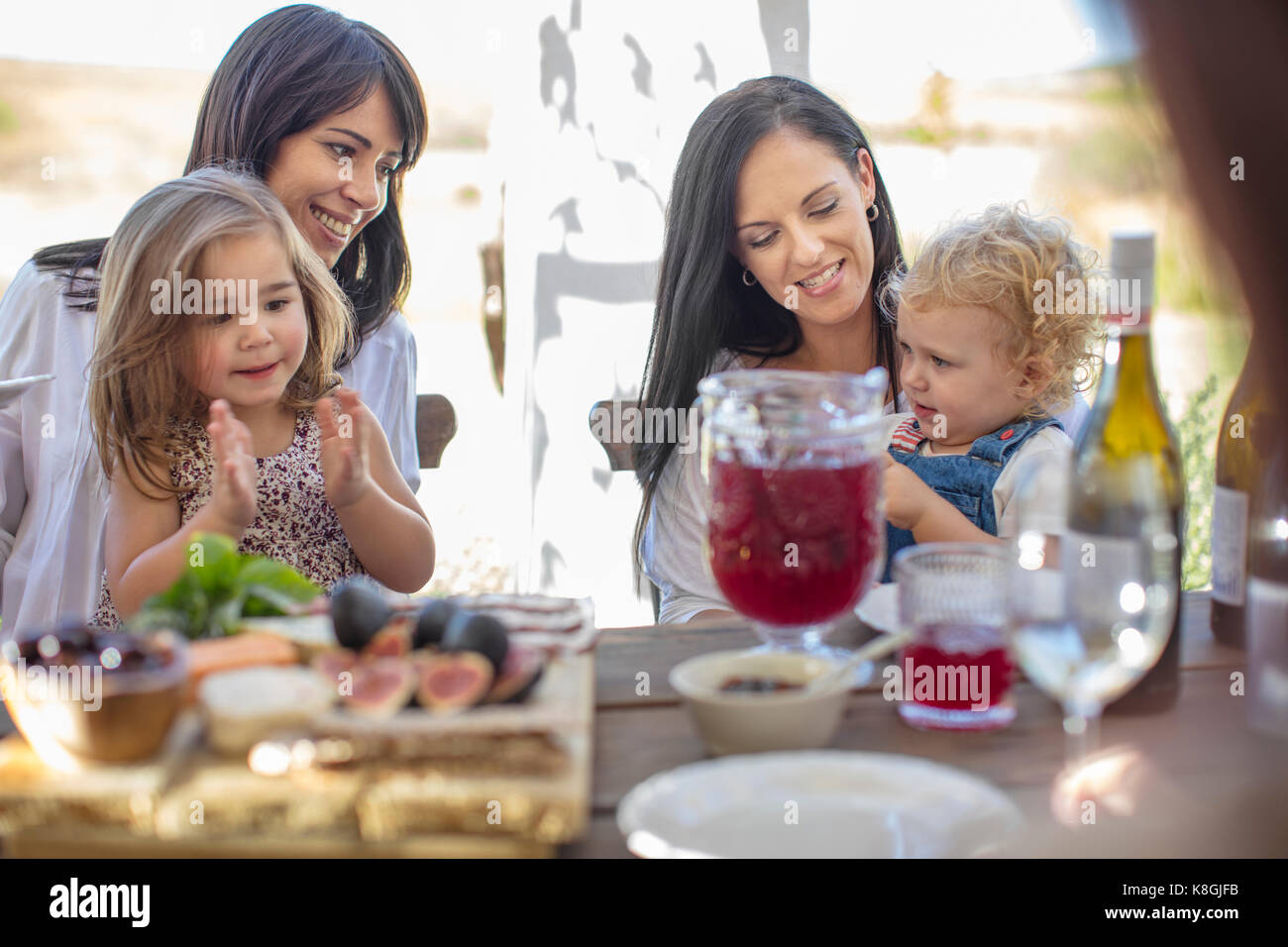 Children at family lunch outdoors Stock Photo - Alamy