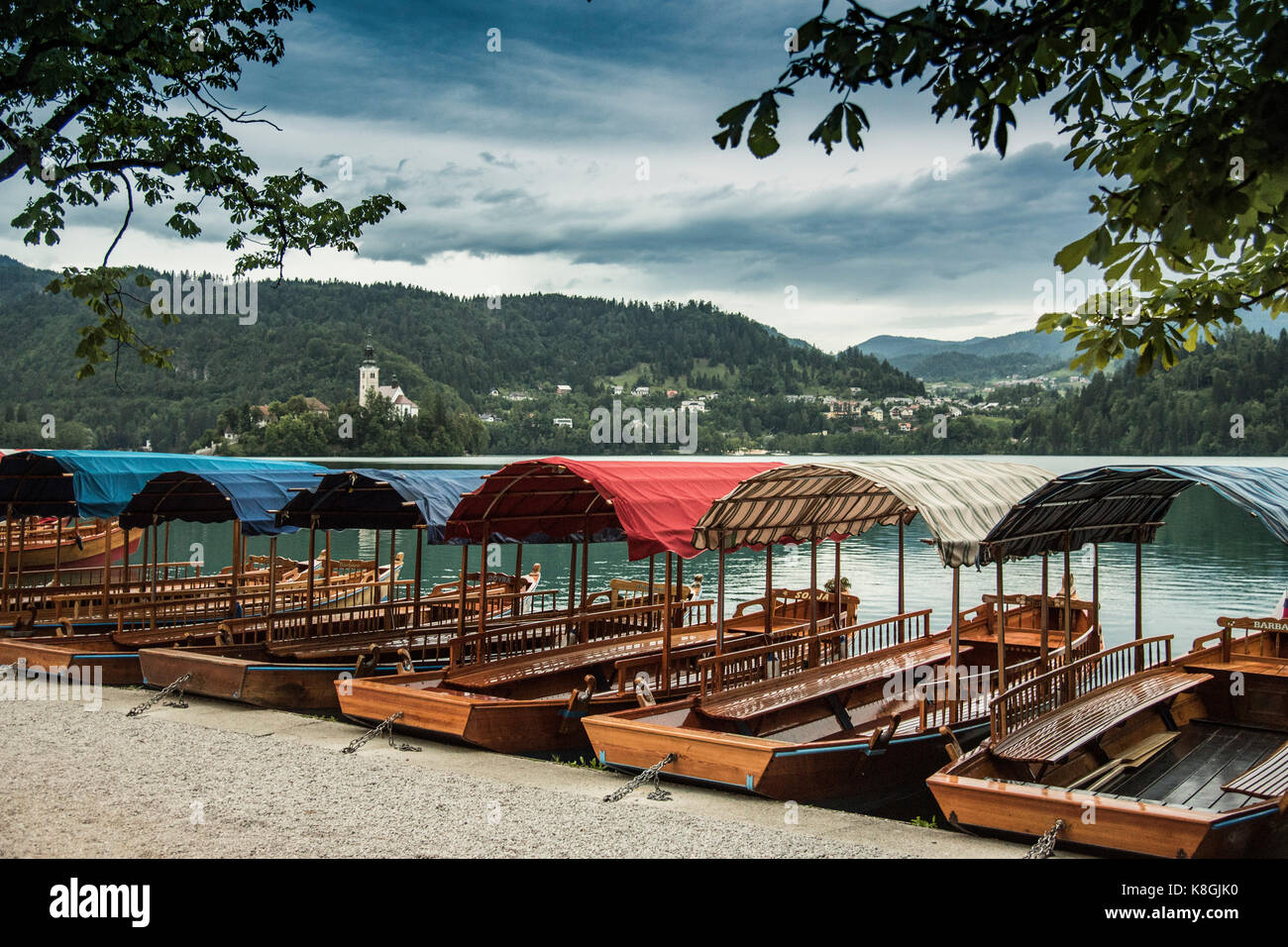 Tourist boats on Lake Bled waterfront, Slovenia Stock Photo - Alamy