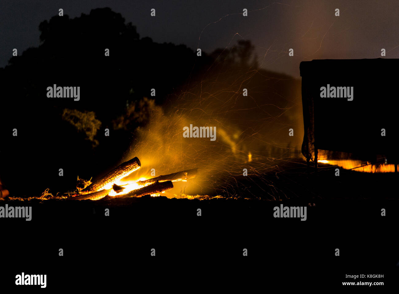 Bonfire burning on beach hi-res stock photography and images - Alamy