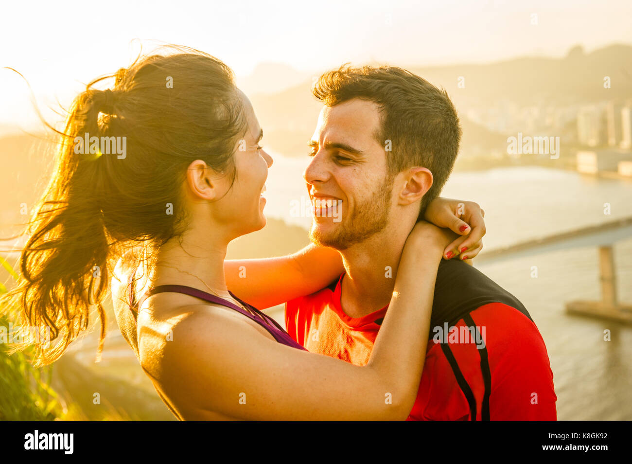 Runners hugging, Rio de Janeiro, Brazil Stock Photo - Alamy