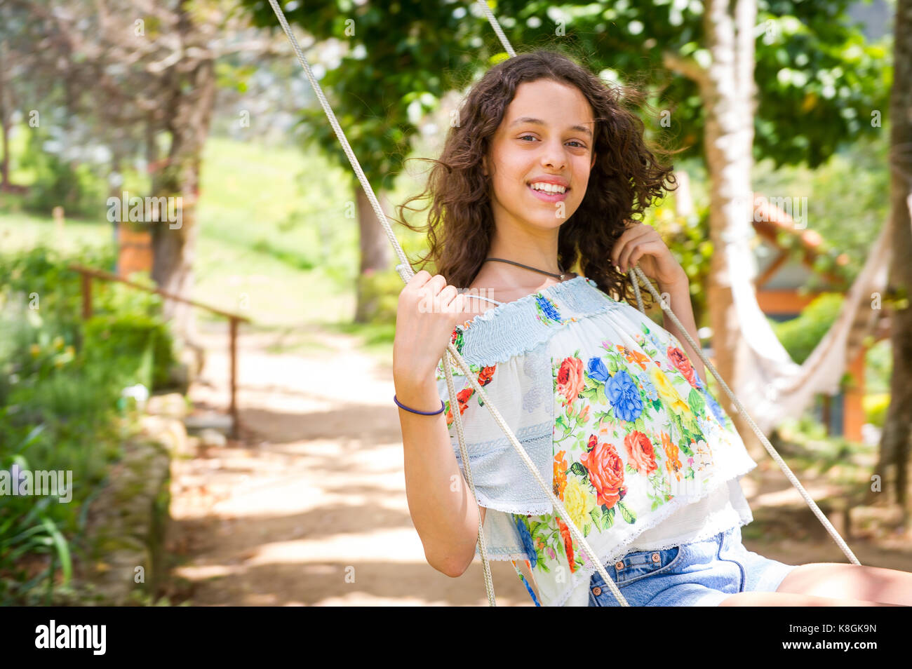 Girl on swing, Rio de Janeiro, Brazil Stock Photo - Alamy
