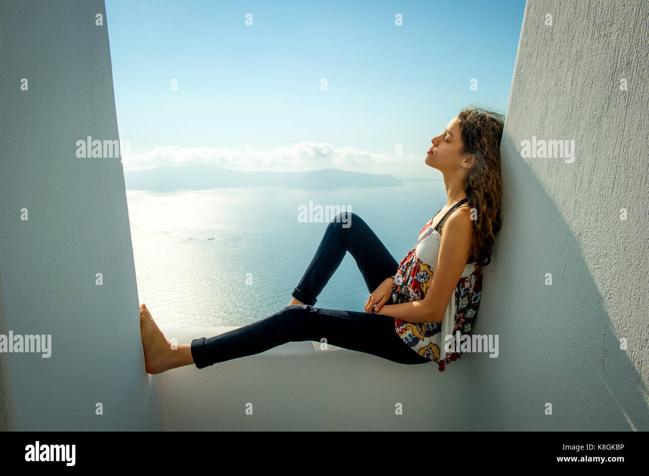 Legs girl leaning against wall hi-res stock photography and images - Alamy