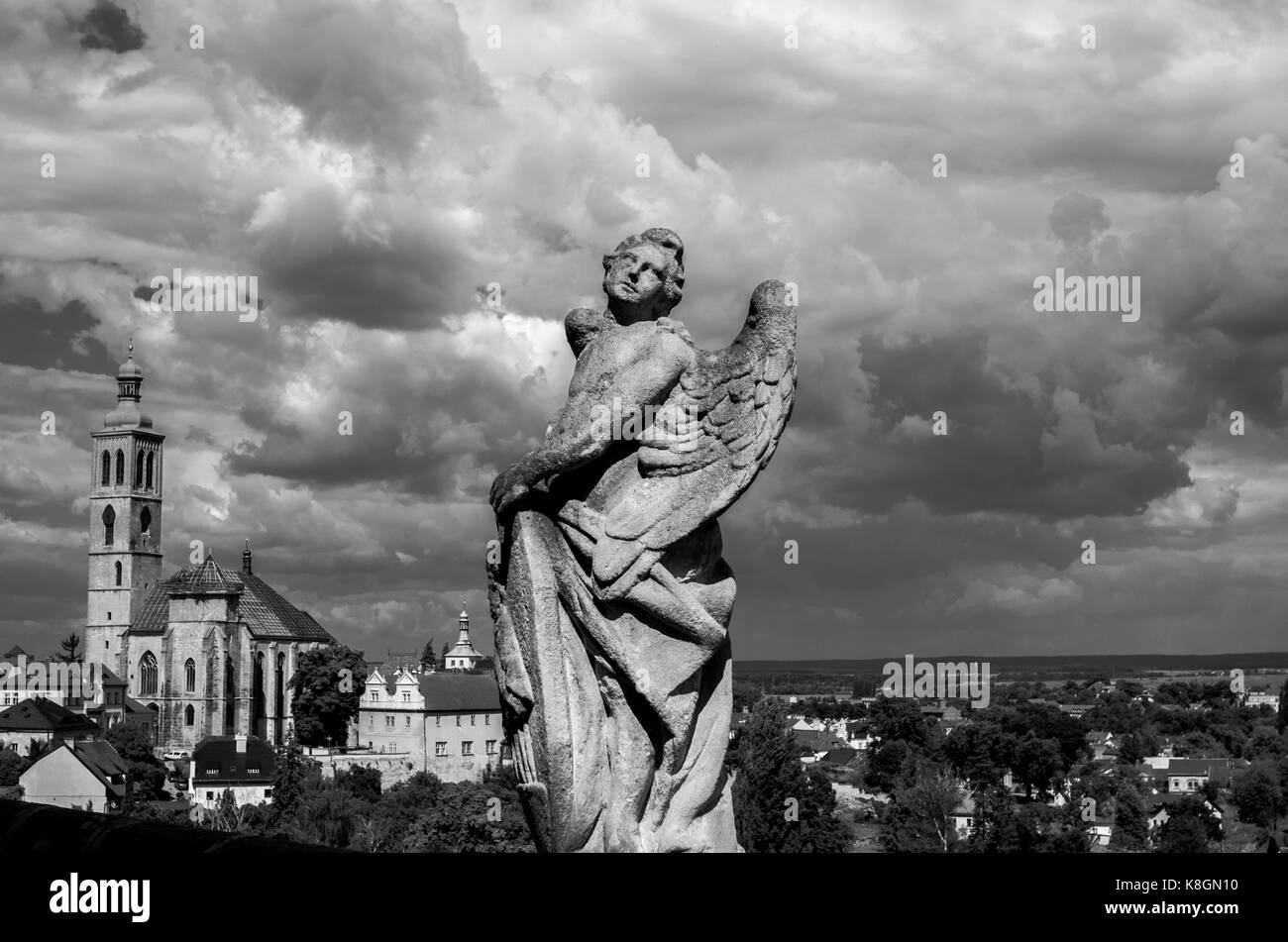 Angel statue and dramatic cloudy sky, Kutna Hora, Czech republic Stock ...