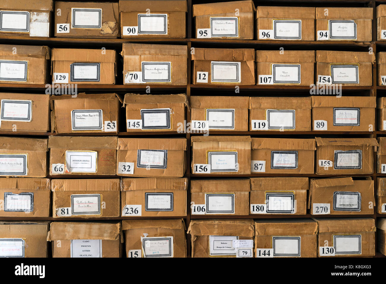 old cardboard boxes fill shelves Stock Photo - Alamy