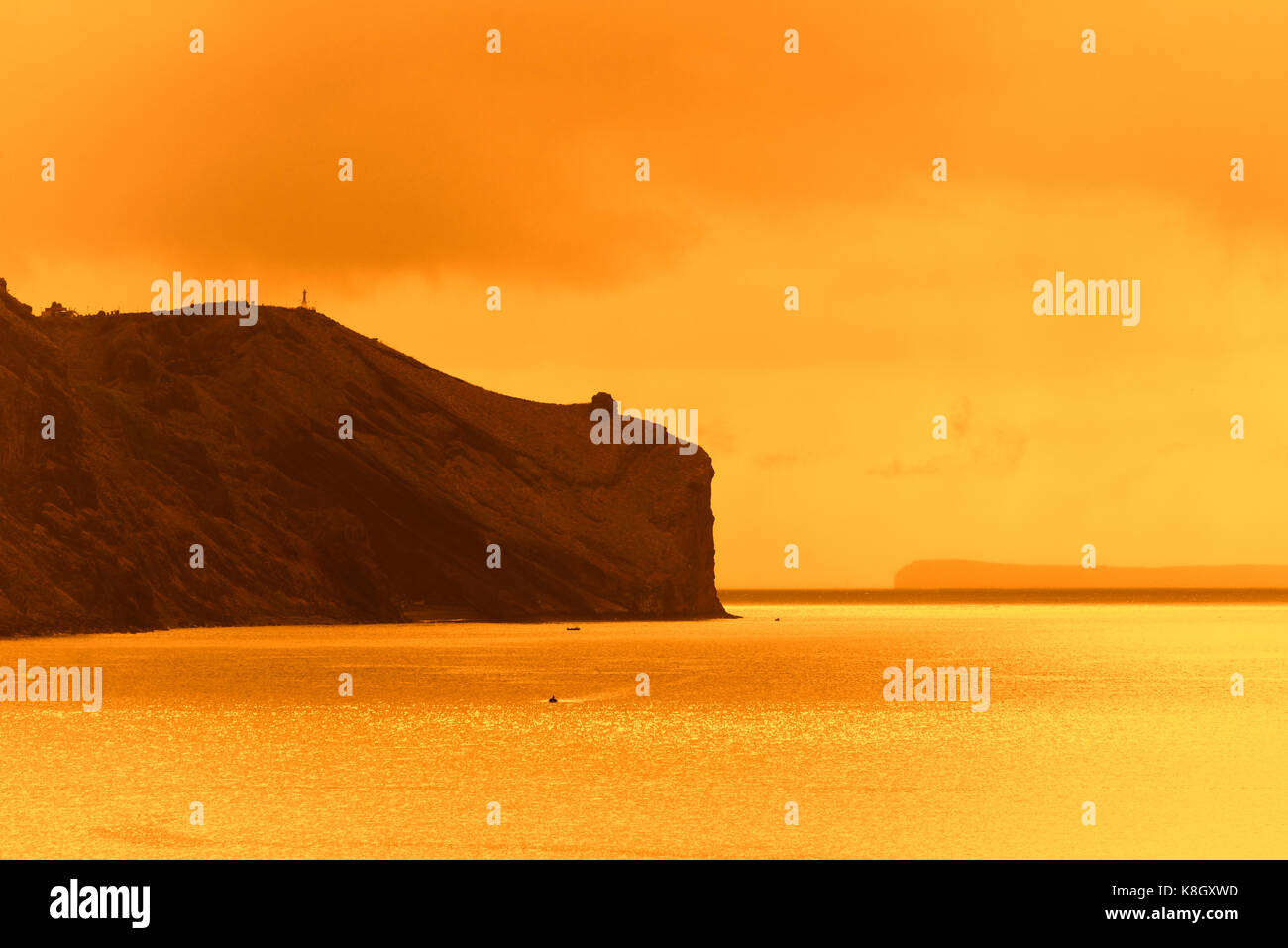 cliffs at sunset Stock Photo - Alamy