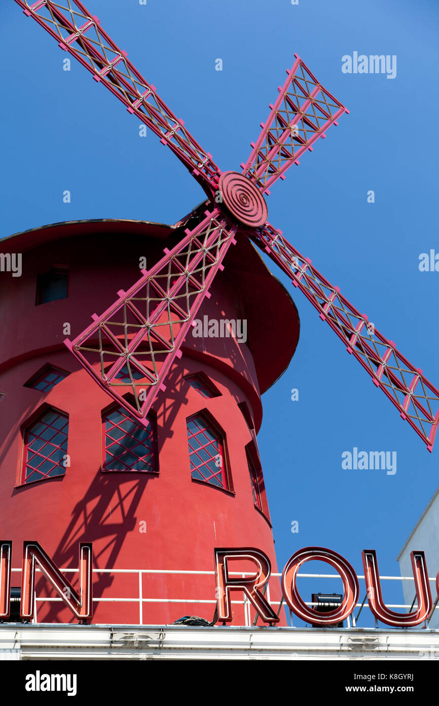 France, Paris, the iconic red windmill above the Moulin Rouge cabaret ...