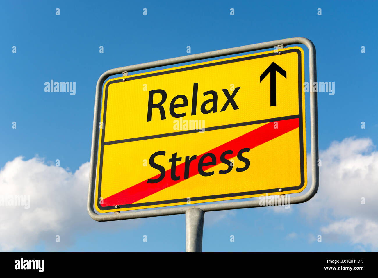 Yellow street sign with relaxation ahead leaving stress behind close up ...