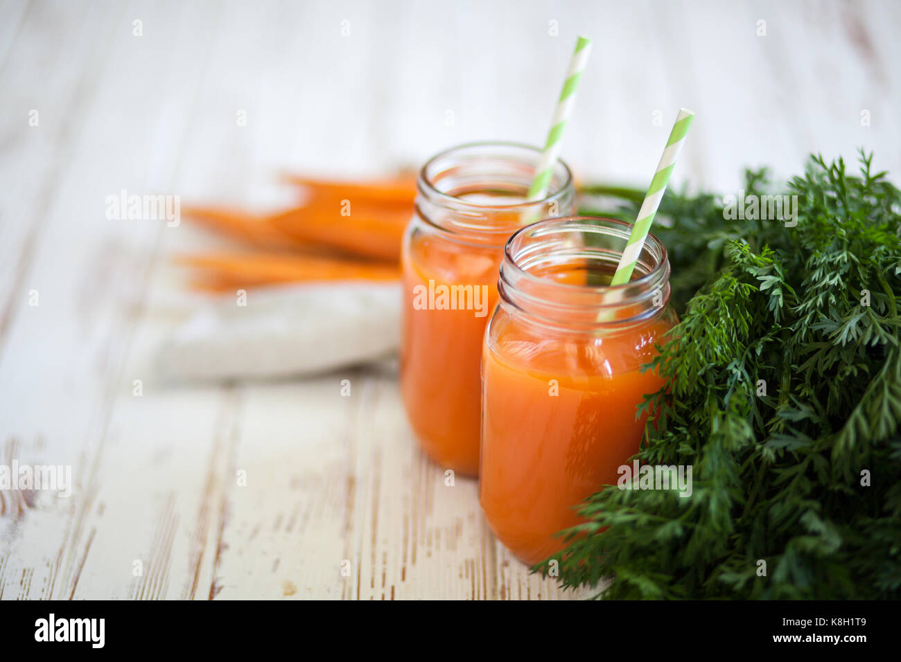 Fresh carrot juice in a bottle Stock Photo - Alamy